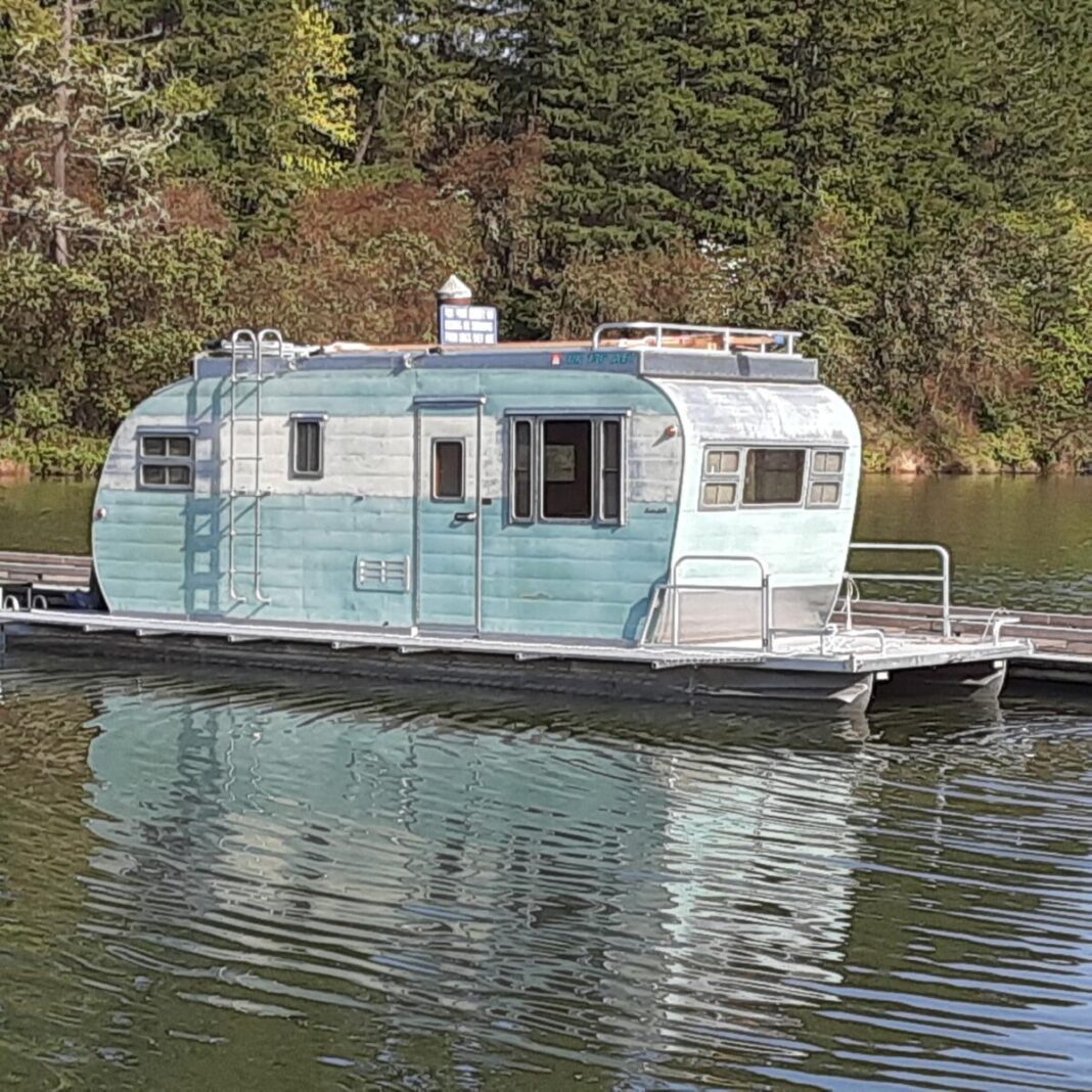 You've got to see this vintage trailer-turned-houseboat - RV Travel