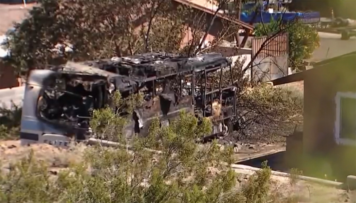 Flaming motorhome veers off road, crashes into backyard